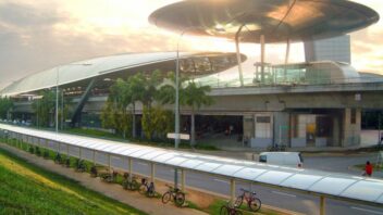 Is Singtel's Comcentre redevelopment similar to what McDonald's did in ...