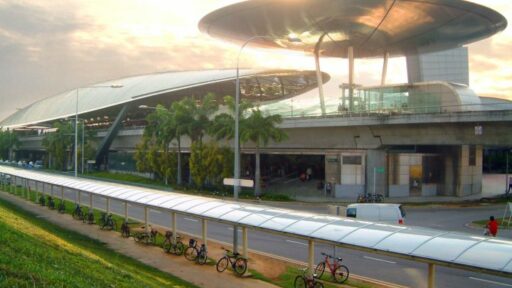 Is Singtel's Comcentre redevelopment similar to what McDonald's did in ...